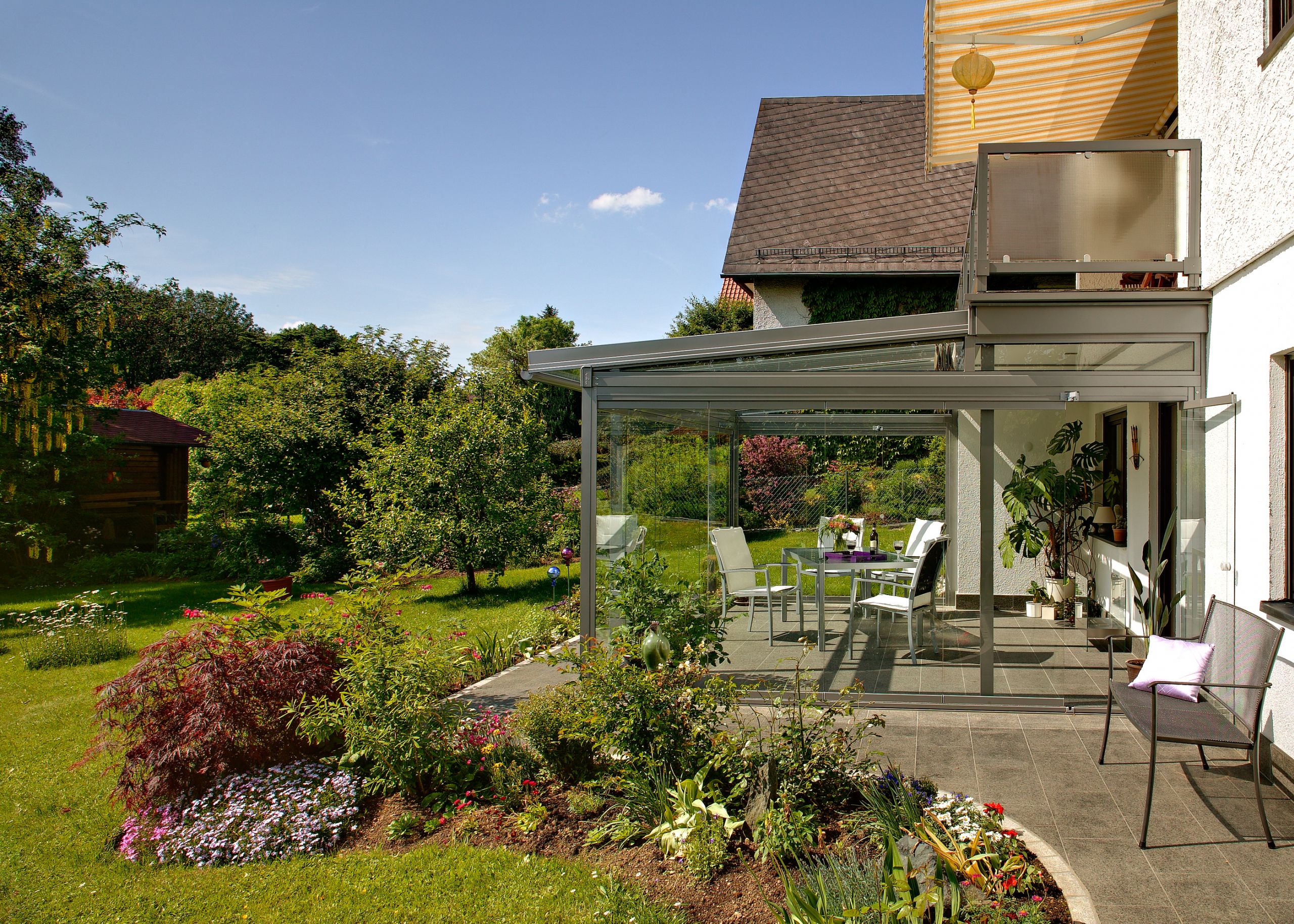 Cabrio-Veranda® mit passender Balkonverglasung bei Hof - BAUMANN ...